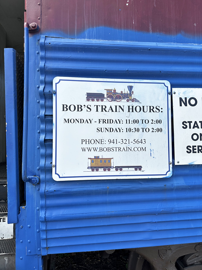 The blue exterior sign announces Bob's operating schedule &ndash; a reminder that the best hidden gems often keep their own special hours.