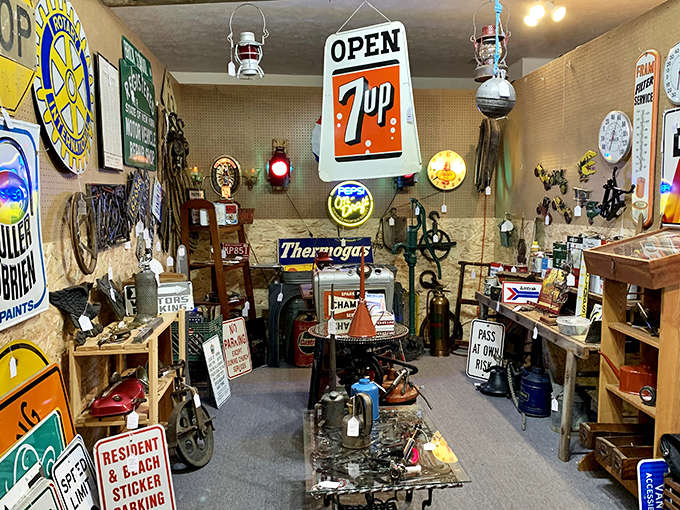 Vintage signs, thermometers, and advertisements create a colorful timeline of American pop culture and beloved brands through the decades.