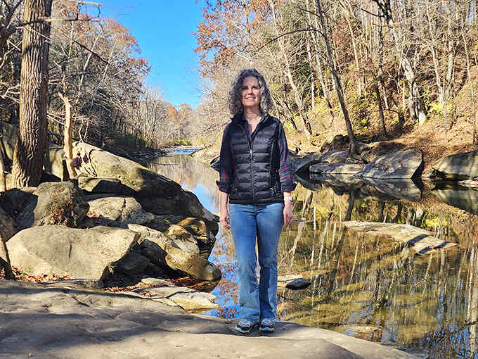 A visitor takes in the magnificent river views, reminding us that sometimes the best way to solve life's problems is to stand beside flowing water.