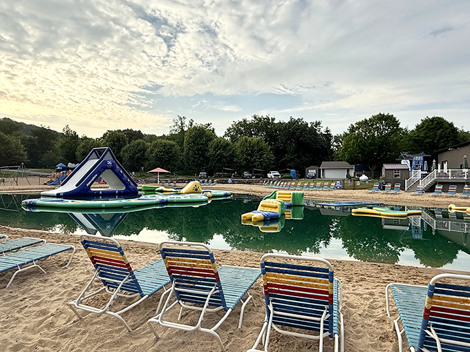 Dawn at the water park reveals inflatable challenges awaiting brave jumpers &ndash; before the chorus of splashes and giggles begins.