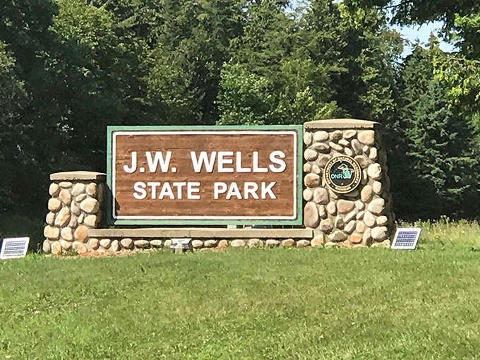 The entrance sign &ndash; your official invitation to leave the world behind and enter a realm of natural tranquility.