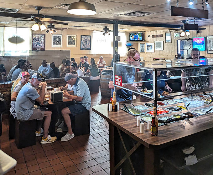 The diverse crowd at The Chuckbox proves great food brings everyone together. College students, families, and locals all united by burger love.