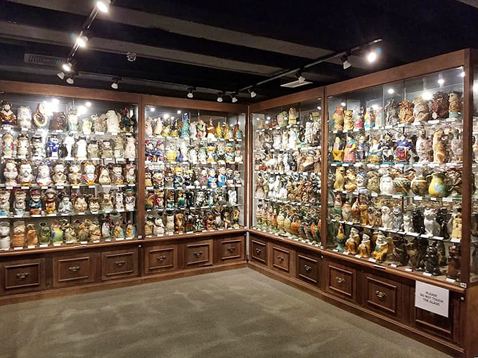 Display cases filled with ceramic Toby Jugs showcase the impressive variety in this unique collection.