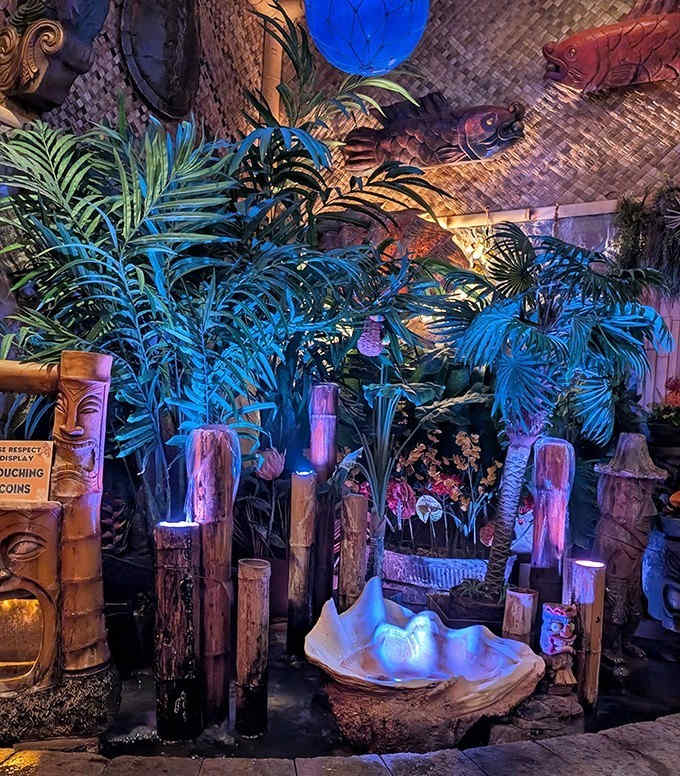 Lush tropical plants, carved tiki statues, and exotic lighting transform Lola's into an island getaway where pizza meets paradise.