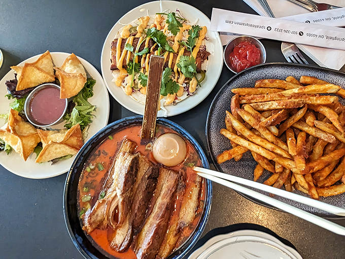 A feast for the eyes and stomach &ndash; crispy rangoons, savory tacos, and hearty ramen create an irresistible spread.
