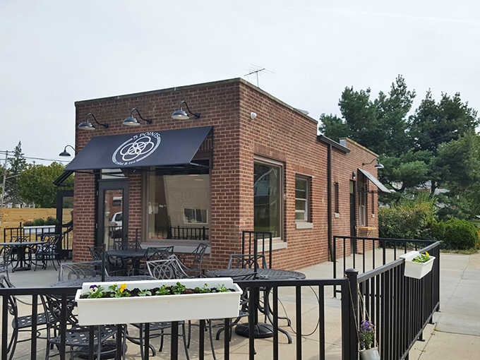 A charming brick building houses 5 Points Coffee & Tea, where Irish hospitality meets Cleveland's neighborhood warmth in every carefully crafted cup.