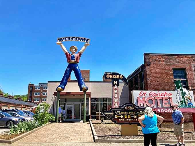 The American Sign Museum's exterior announces itself with vintage flair &ndash; that cowboy's been welcoming folks since signs were an art form, not just information.