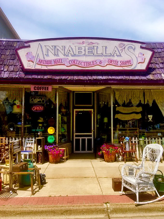 Annabella's welcoming storefront beckons with vintage charm, rocking chairs, and colorful flowers&mdash;a prelude to the treasures waiting inside. 