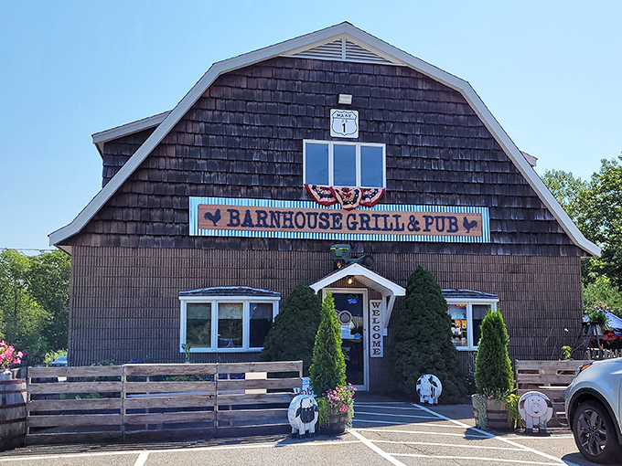 The distinctive barn-shaped silhouette of Barnhouse Grill & Pub stands proudly along Route 1 in Wiscasset, promising rustic charm and comfort food perfection.