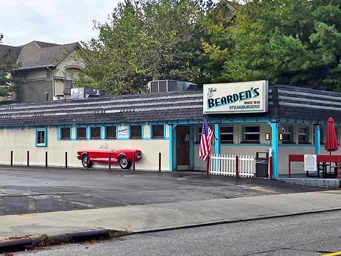 The classic diner facade with turquoise trim and vintage signage isn't trying to be retro &ndash; it actually IS retro, complete with a cherry-red Mustang that's part of the permanent scenery.