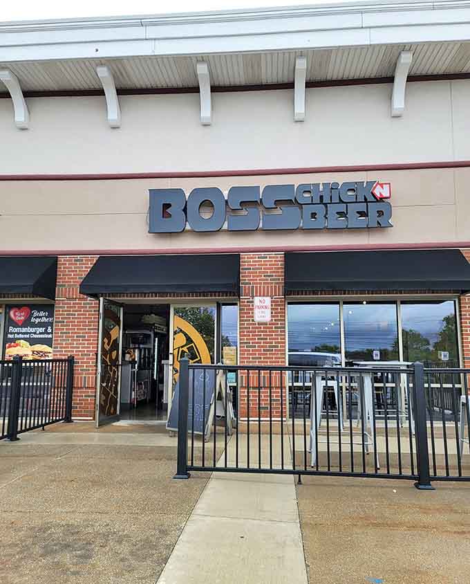 The bold blue signage of Boss Chick N Beer beckons from its brick-faced storefront, promising a flavor adventure that lives up to its confident name.