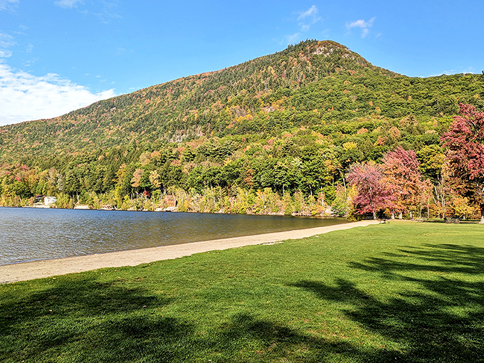 Branbury State Park welcomes visitors with its pristine shoreline and mountain backdrop, a perfect escape from everyday chaos.