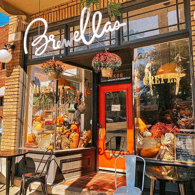 That bright red door and vintage signage practically beg you to come inside and see what magic awaits in this Lakewood gem.