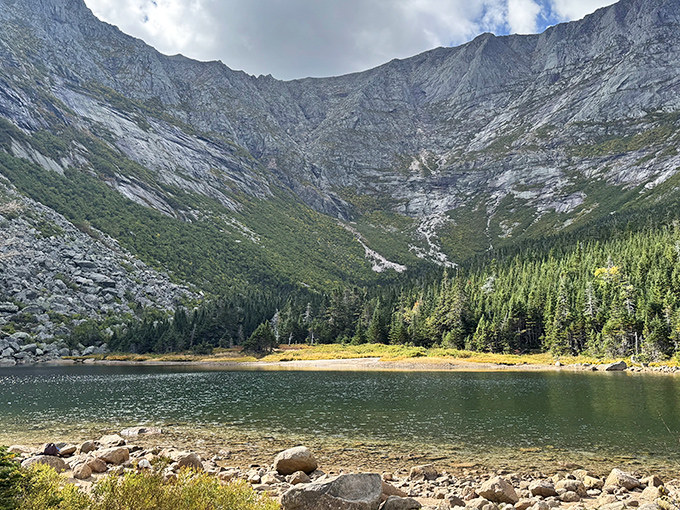 Nature's perfect mirror: Chimney Pond reflects Mount Katahdin's granite face with such clarity you'll question which way is up!