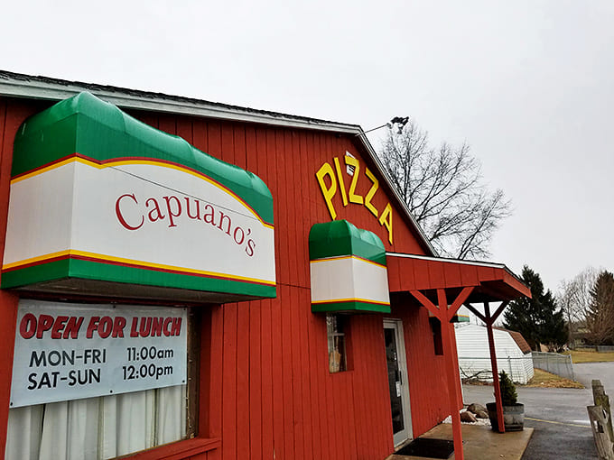 The bright red building with its distinctive green-trimmed signage stands like a beacon of deliciousness in Pataskala, promising Italian treasures within.
