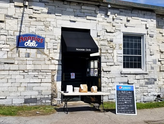 A charming stone facade that looks like it was plucked from a Vermont postcard&mdash;complete with that classic small-town deli charm.