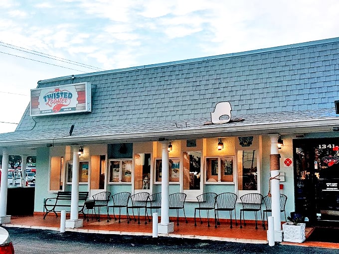 Welcome to seafood paradise! Twisted Lobster's charming facade promises a feast for the senses, with its inviting porch practically begging you to stay awhile.