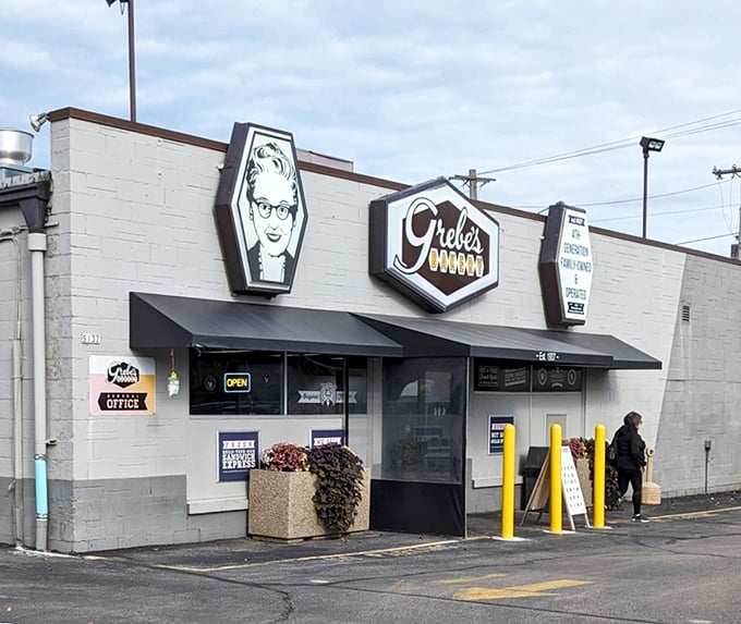 The iconic Grebe's Bakery storefront stands as a beacon of sweet salvation in West Allis, promising cruller nirvana to all who enter.