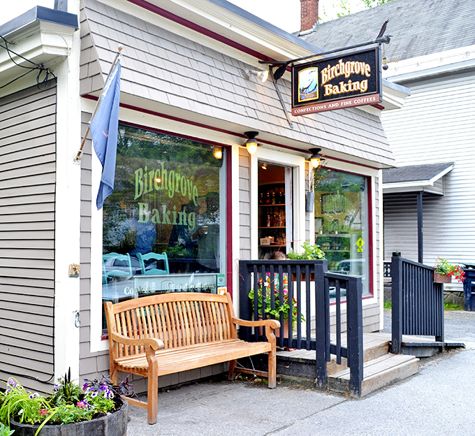 A charming wooden bench welcomes visitors outside Birchgrove Baking, where pastry dreams come true in Vermont's capital city.