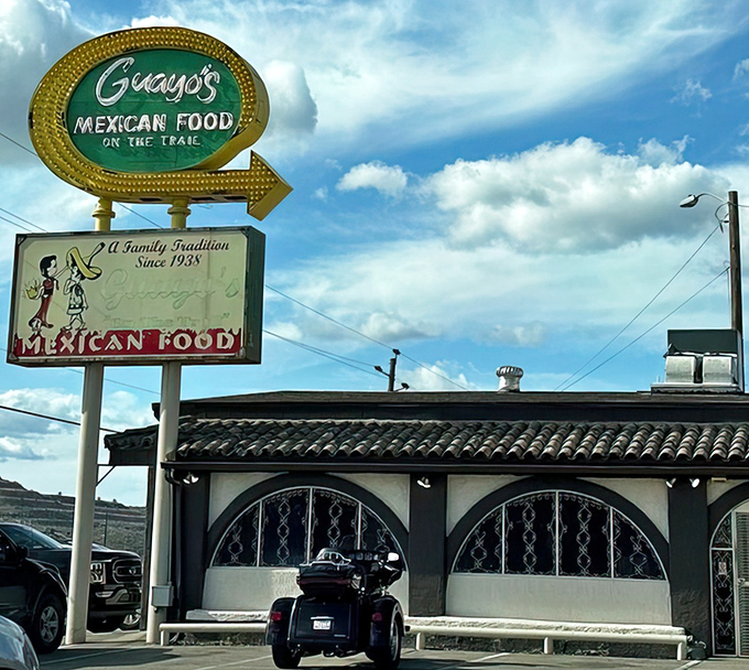 The iconic Guayo's sign stands proud against the Arizona sky, a beacon for hungry travelers seeking authentic Mexican cuisine since 1938.