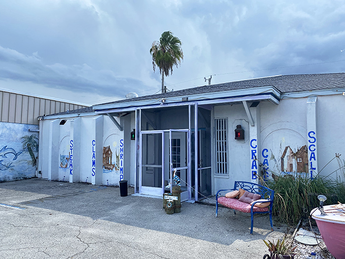 The unassuming exterior of New England Moorings hides a world of nautical charm and seafood treasures within its humble walls.