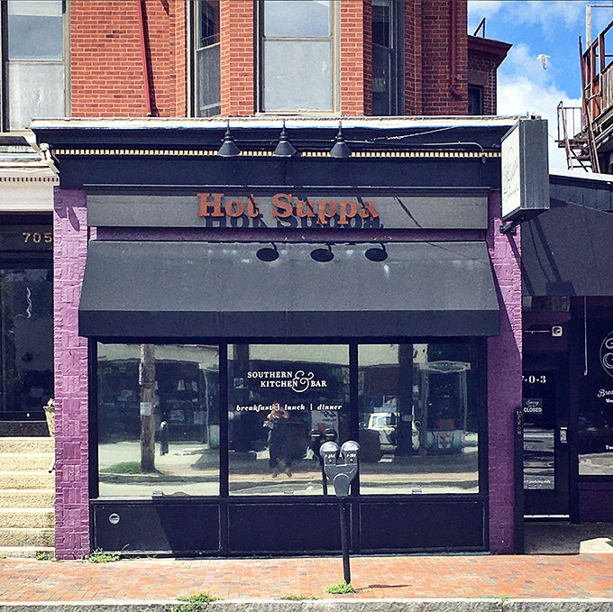 The purple-painted storefront of Hot Suppa stands out on Congress Street, promising Southern comfort in the heart of Portland.