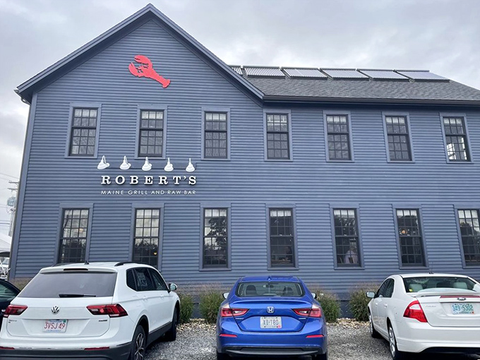 The distinctive blue exterior of Robert's Maine Grill stands out like a maritime beacon, promising seafood treasures within its welcoming walls.