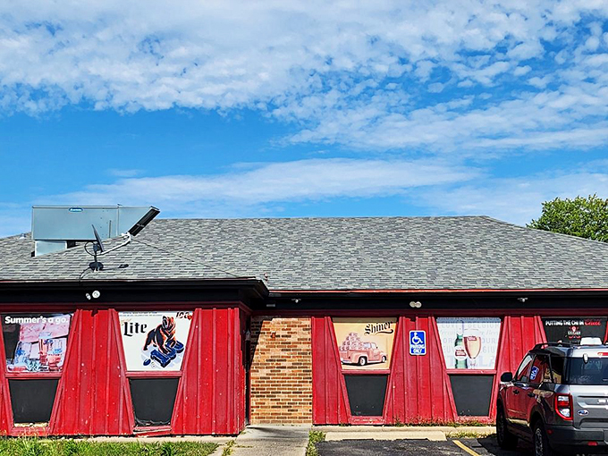 Welcome to flavor town! Big Ed's red-trimmed exterior promises a smoky paradise within. Resistance is futile, barbecue lovers.