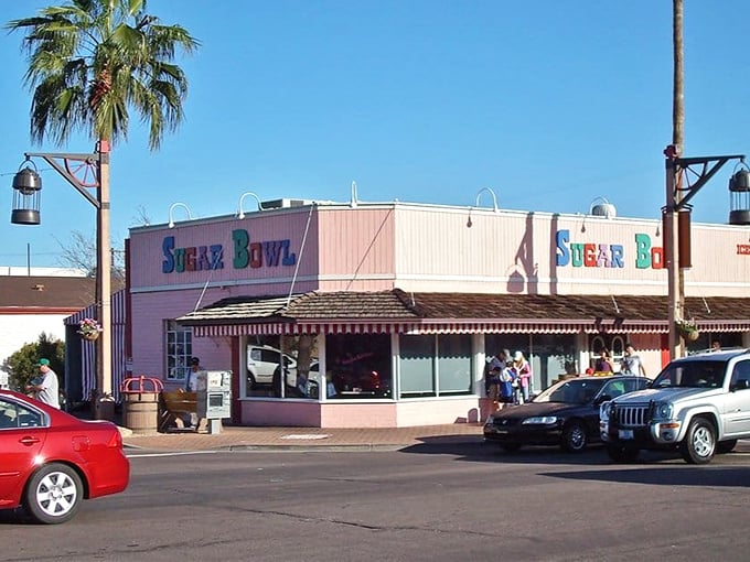The iconic pink exterior of Sugar Bowl stands out against the Arizona sky, a beacon of sweet nostalgia in Old Town Scottsdale.