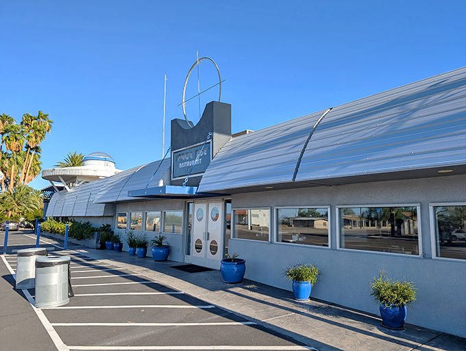The Space Age Restaurant's distinctive silver-domed exterior gleams under the Arizona sun like a UFO that chose Gila Bend as its landing spot.