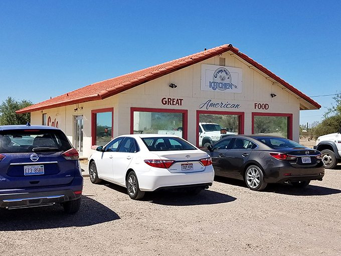 Exterior: The cheerful yellow exterior with its distinctive red-tiled roof stands like a beacon of culinary promise in the Arizona desert landscape.