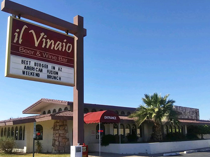 Il Vinaio's Spanish-style exterior with its iconic sign promises "Best Burger in AZ" – a bold claim this wine bar actually delivers on.
