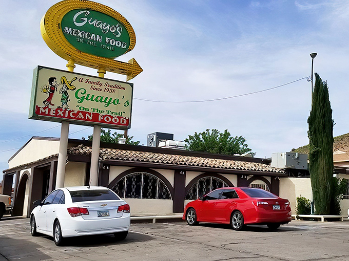 The iconic vintage sign of Guayo's on the Trail stands proudly against the Arizona sky, a beacon of authentic Mexican cuisine that's been drawing locals for generations.