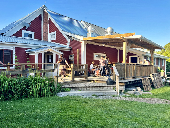 The charming red exterior of Parker Pie Company beckons like a culinary lighthouse in Vermont's rolling countryside, promising delicious discoveries within.