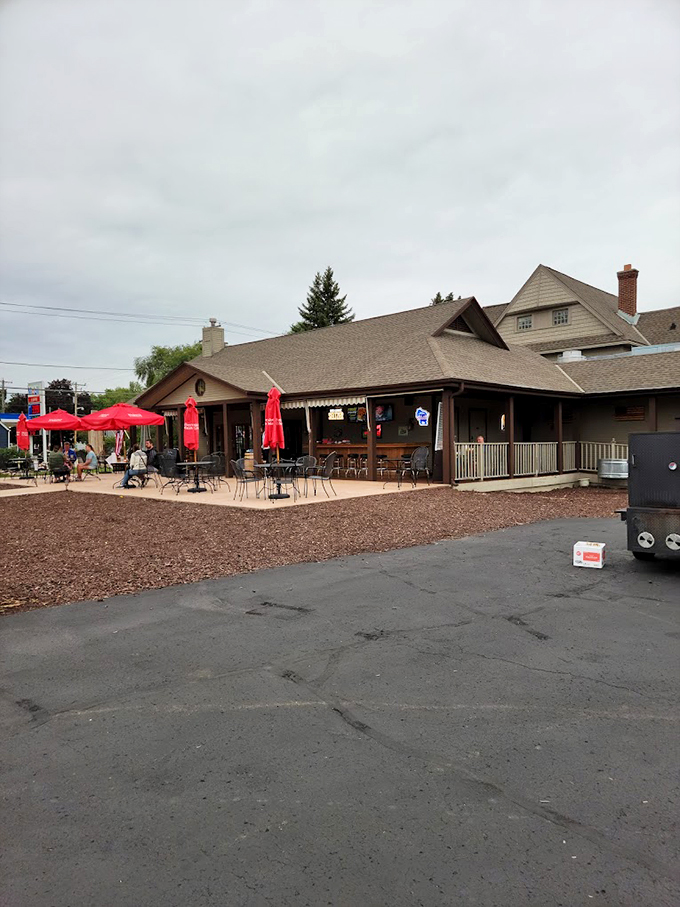 Rustic charm meets culinary magic. This unassuming building houses a world of mouthwatering barbecue. Don't let the modest facade fool you!