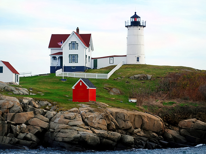 The iconic Cape Neddick 'Nubble' Light stands proudly on its rocky perch, like Maine's version of a perfectly composed postcard.