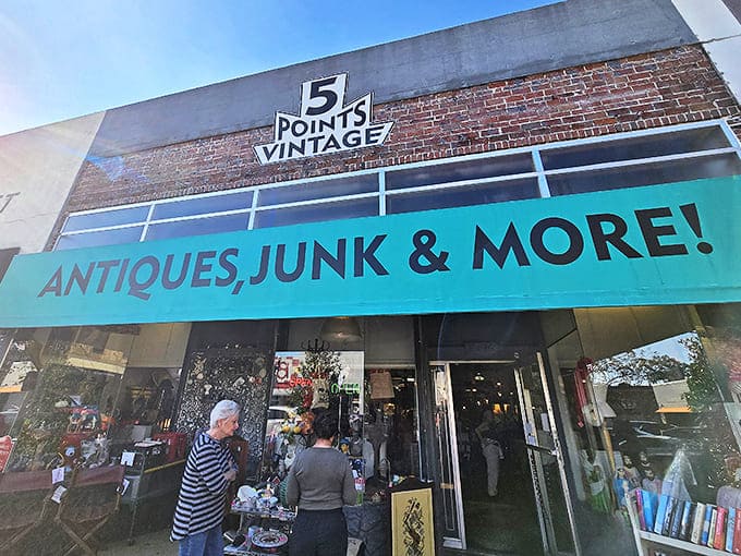 The turquoise storefront of 5 Points Vintage boldly announces "ANTIQUES, JUNK & MORE!" – a promise they deliver on with spectacular abundance.