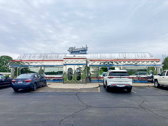 Shiny, happy diner! This chrome-clad time capsule gleams like a beacon of nostalgia, promising delicious adventures within.