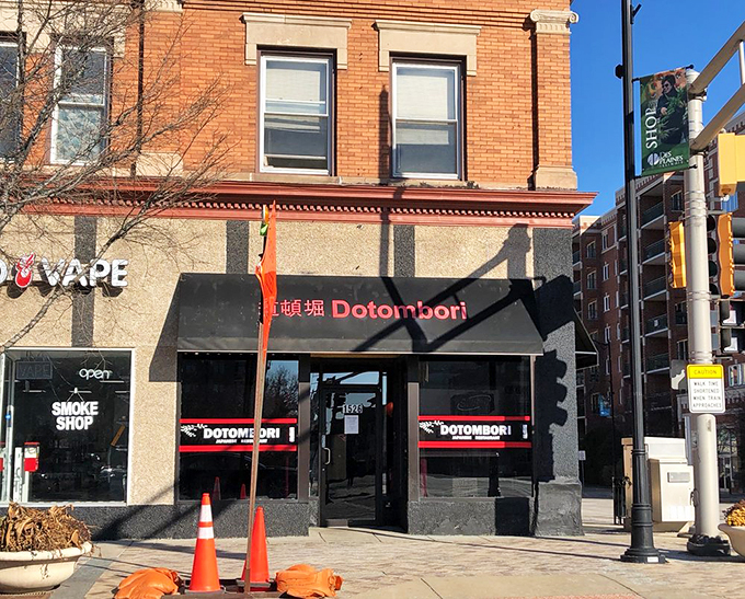 A slice of Japan tucked into downtown Des Plaines, where the red characters promise authentic flavors behind that welcoming black awning.