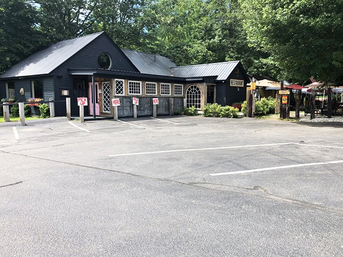 A charming New England time capsule, where the black-shingled exterior and metal roof whisper tales of countless lobster feasts since 1931.