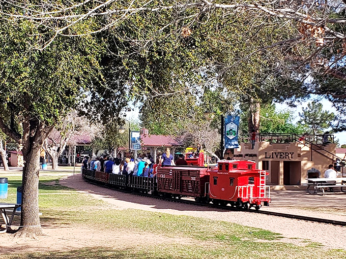 All aboard the nostalgia express! This mini-locomotive isn't just whistling Dixie—it's carrying a cargo of joy through McCormick-Stillman Railroad Park.