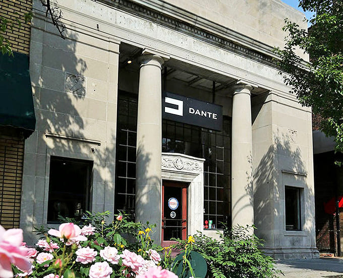 Dante: Where classical architecture meets culinary artistry, this former bank's imposing facade promises a deposit of delicious memories.