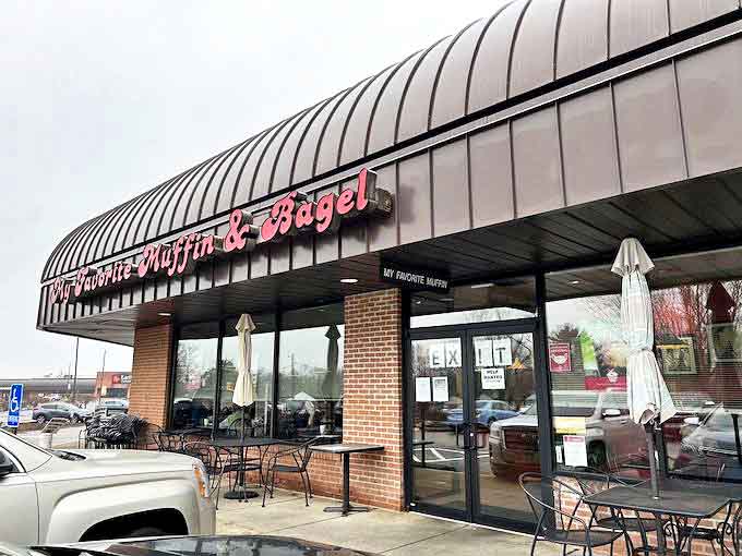 The distinctive curved metal roof and bold red signage of My Favorite Muffin & Bagel stands as a beacon for carb-lovers throughout Centerville.