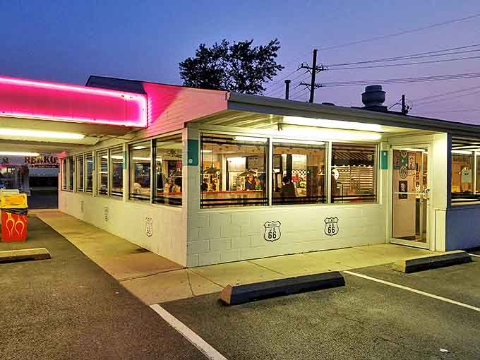 That pink neon glow isn't just calling you home, it's calling you to dinner at this retro roadside gem.