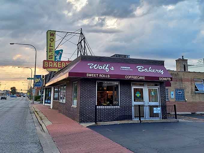 Wolf's Bakery stands proudly on the corner, its vintage neon sign a beacon of sweetness that's been guiding sugar-seekers for generations.
