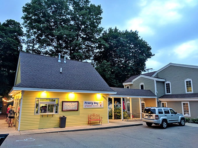 Exterior: The sunshine-yellow cottage beckons like a sweet mirage, promising frozen delights under Michigan skies. Frosty Boy's charm starts before the first lick.