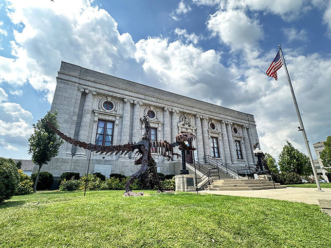 Majestic limestone columns frame the Dinosaur Discovery Museum, where ancient history meets classical architecture in downtown Kenosha.