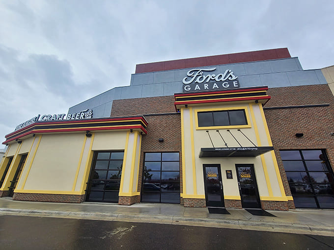 Ford's Garage exterior gleams with vintage charm, its bright yellow facade and classic signage beckoning hungry travelers like a culinary lighthouse.