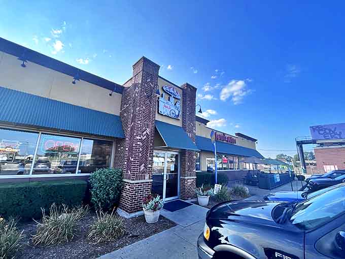 The brick-accented exterior of Fratellos Hot Dogs promises authentic Chicago flavors without the downtown hassle &ndash; a suburban gem hiding in plain sight.