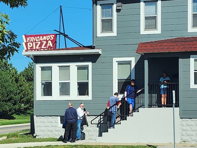 That unassuming exterior hides one of Michigan's greatest pizza treasures, proving you can't judge a pizzeria by its residential-looking cover.